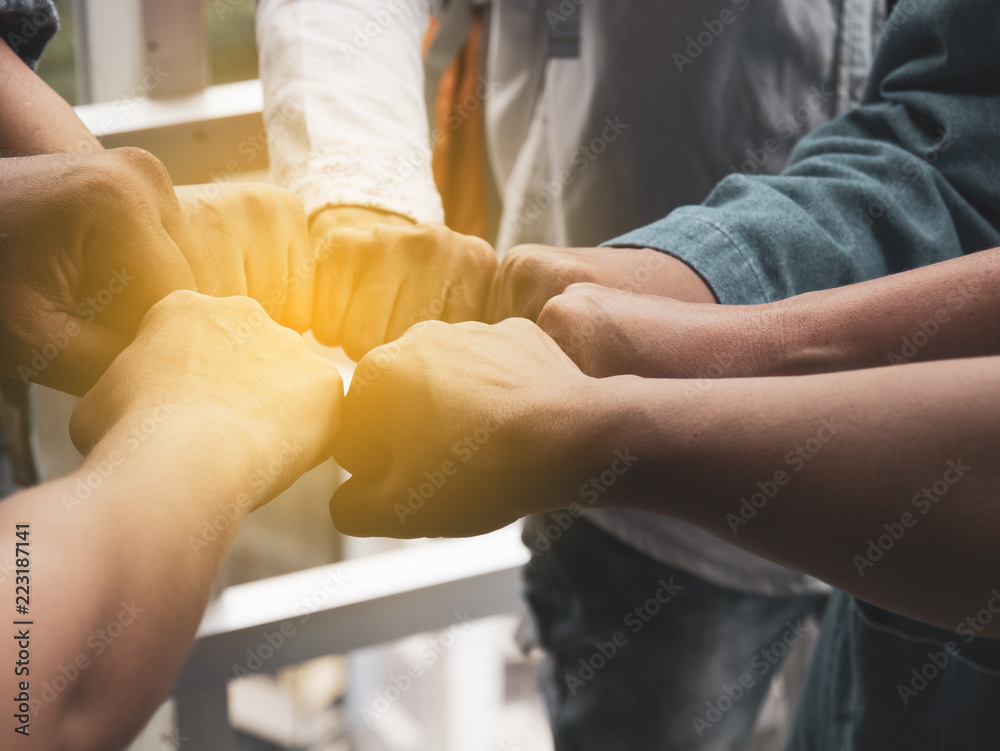 Foto de people join their hands together. Stack people's hands. Unity ...
