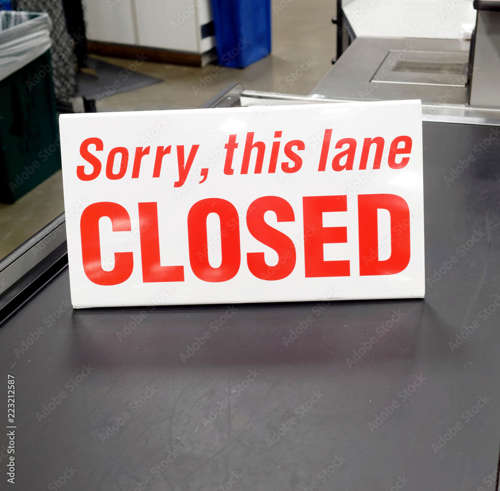Red and white grocery store checkout lane sign: SORRY, THIS LANE CLOSED ...