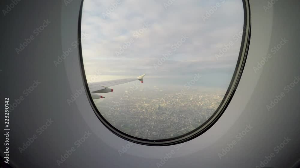 A view of London from the window of an arriving flight with the Shard ...