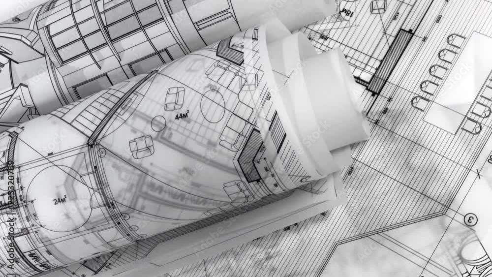 Blueprints - rolls of architectural drawings smoothly rotate on the ...