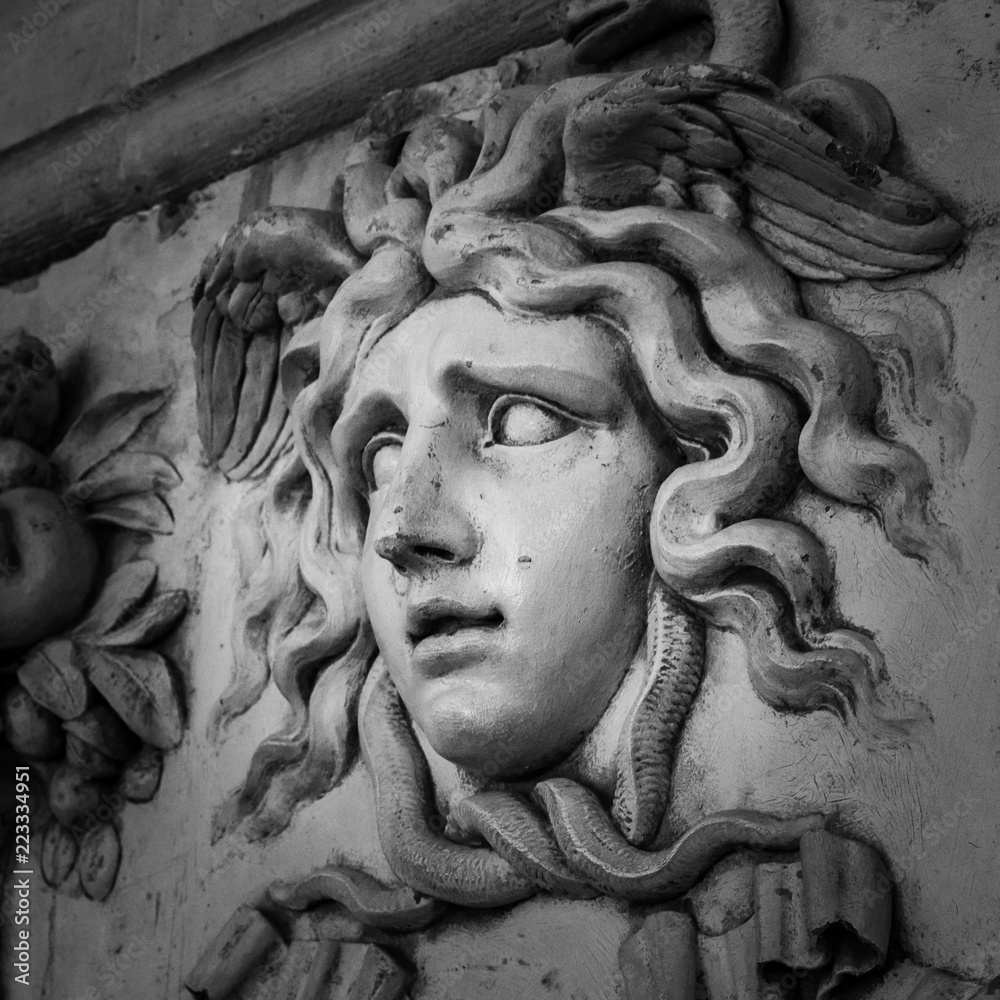 Head with wreath detail of the ancient sculpture Stock Photo | Adobe Stock