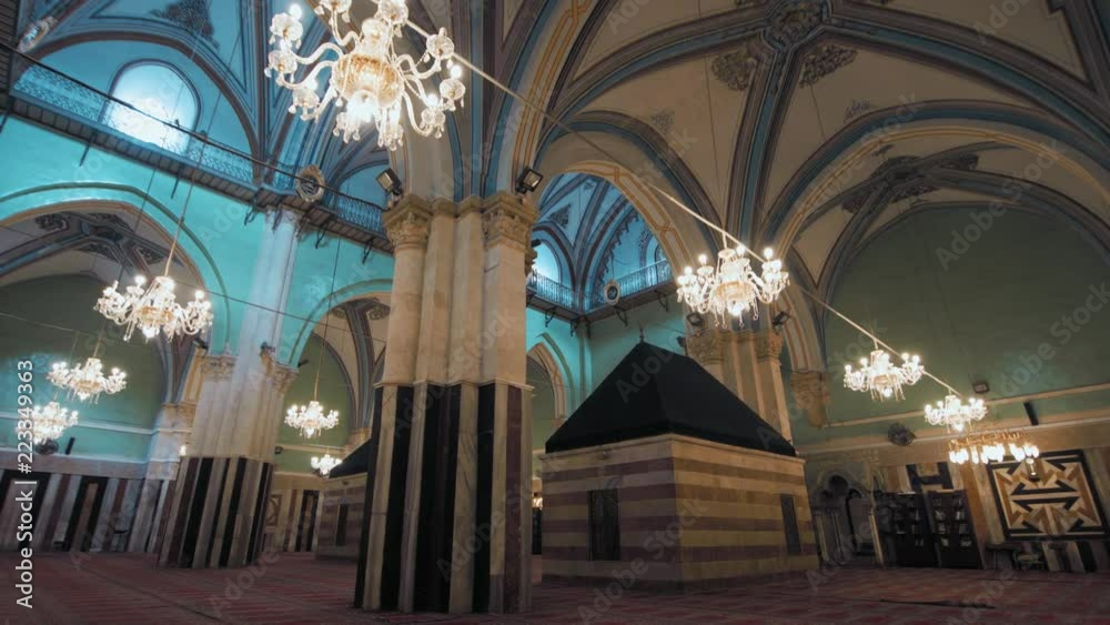 Hebron, Al Khalil, Palestine, West Bank. Wide shot, dolly left inside ...