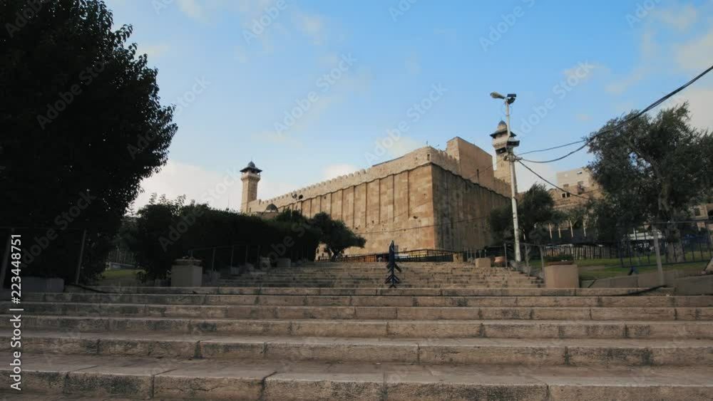 Hebron, Al Khalil, Palestine, West Bank. Wide shot, side dolly right, the Ibrahimi Mosque, Al ...