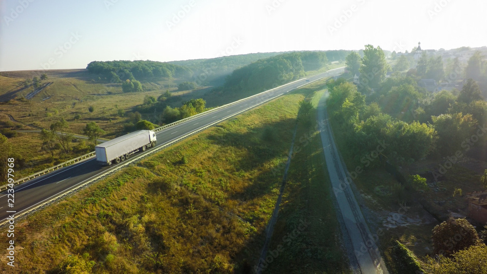 Aerial Top View of White Truck with Cargo Semi Trailer Moving on Road ...