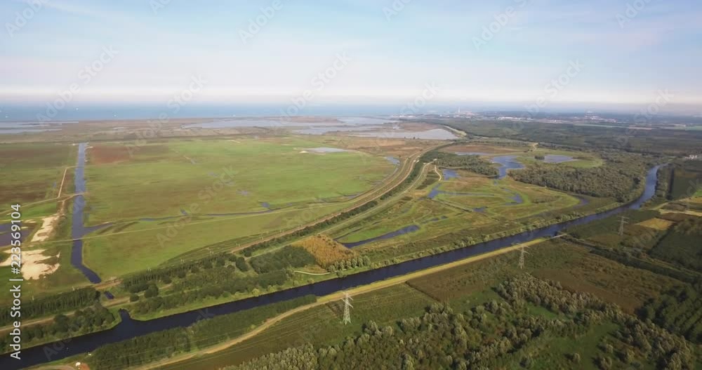 View-over aerial of the Dutch nature park Oostvaardersplassen next to ...