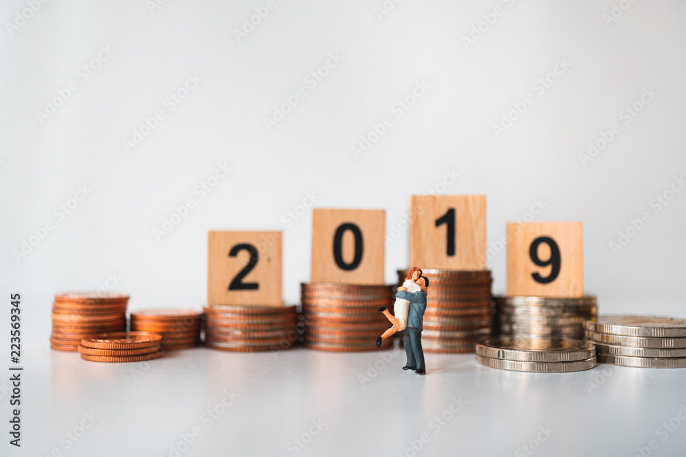 Miniature people, happy man and woman standing wooden block year 2019 ...