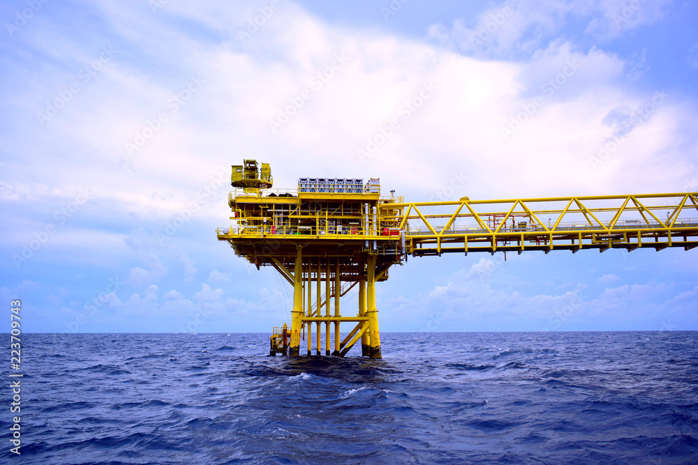 Offshore oil and gas industry, well head remote platform where produced ...