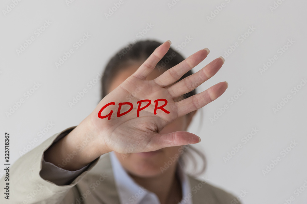 GDPR. A young woman is hidden behind the inscription General Data Protection Regulation. Cyber ...