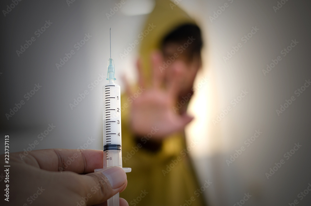 Concept: Asian man rejected drugs."International Day against Drug Abuse ...