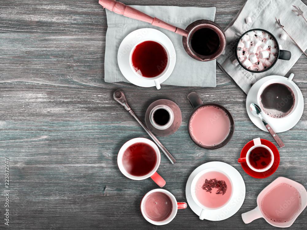Set of different hot drinks in cups and mugs served on wooden table ...