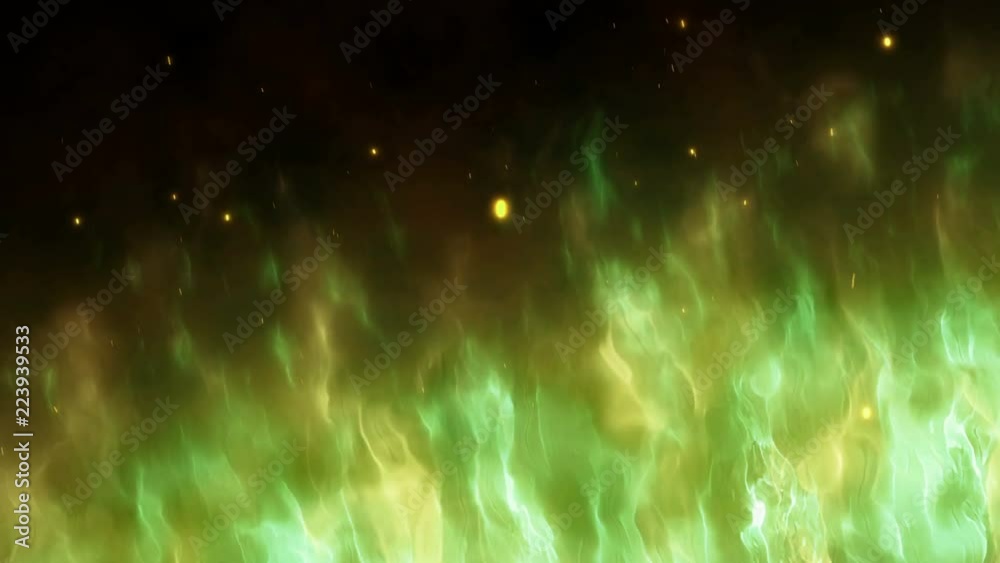 Large green fire with hot sparks rise in the night sky. Burning magic ...