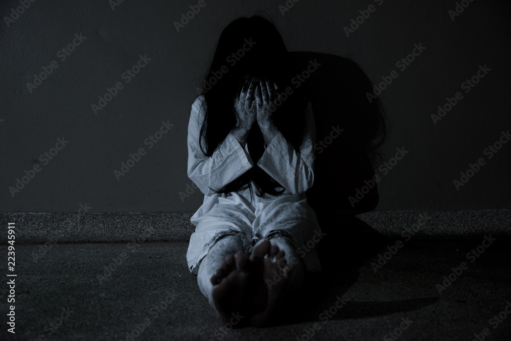 Horror woman ghost creepy sitting on wall her is scary and cry, Stock ...