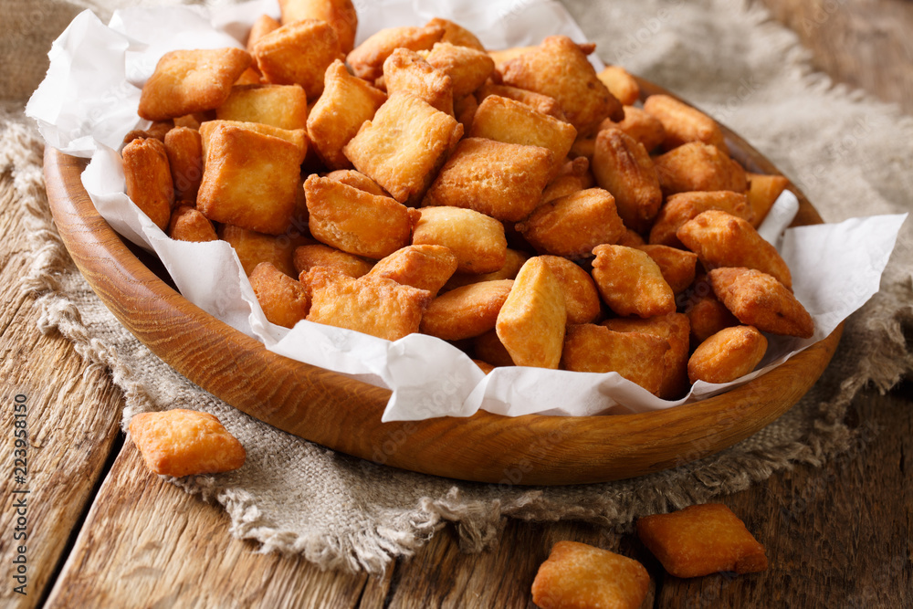 Golden Nigerian snack Chin Chin of deep-fried crispy dough with a ...