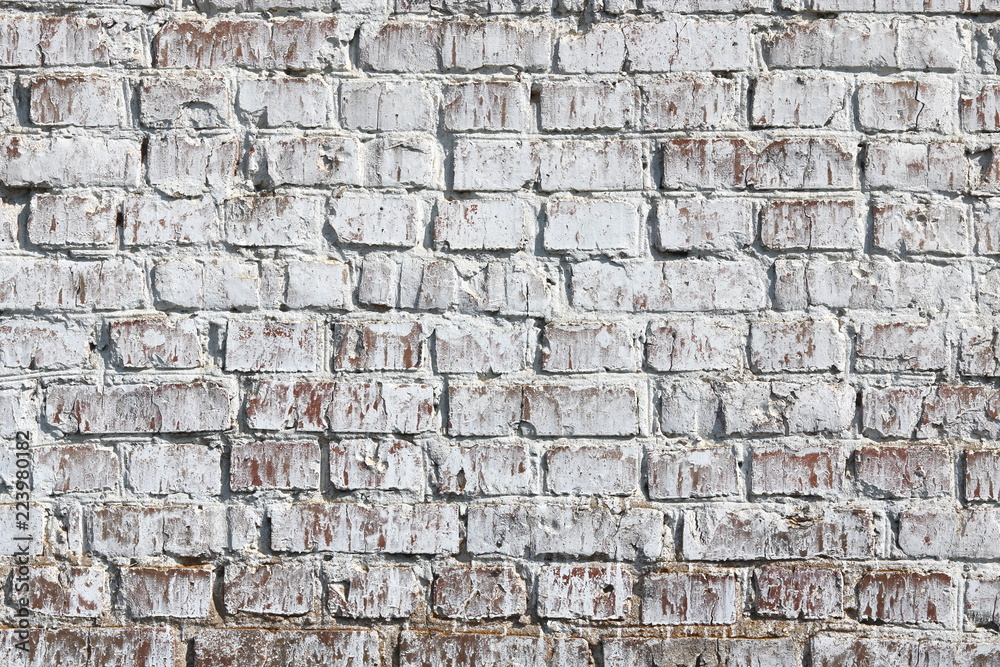 Old wall made of red brick, painted white in loft style for modern ...