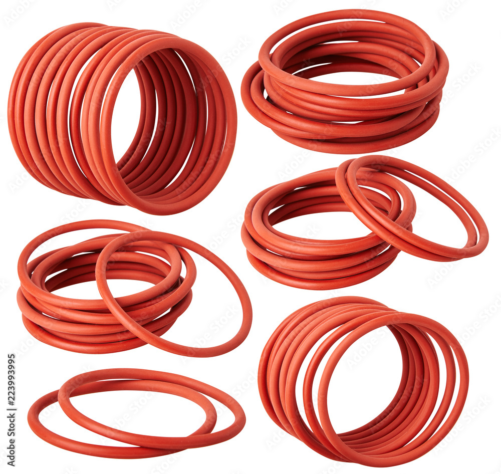 Set of red hydraulic and pneumatic o-ring seals isolated on a white ...