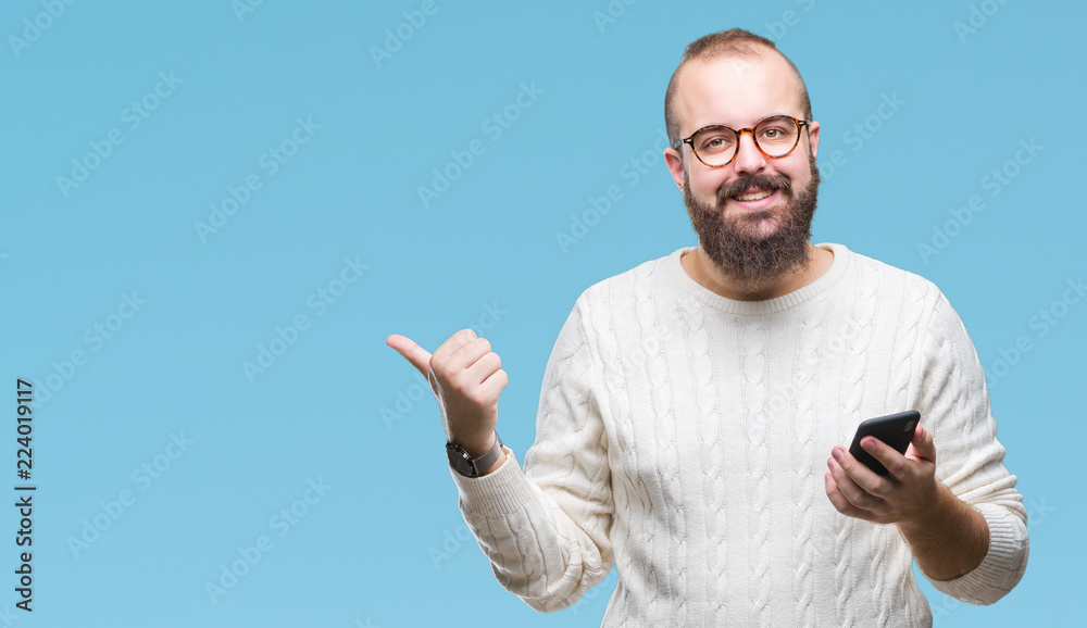 Young caucasian hipster man texting sending message using smartphone ...