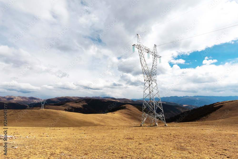 High voltage transmission tower or power tower (electricity pylon) and ...