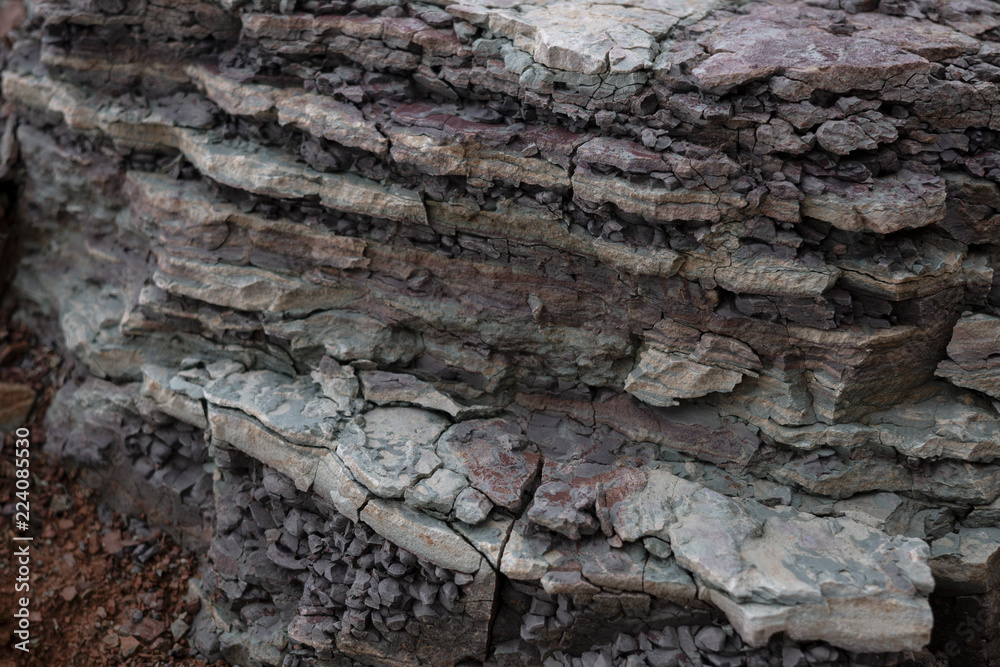 Soil cut-sandstone, stones, clay, sand structure and layers. slice of ...