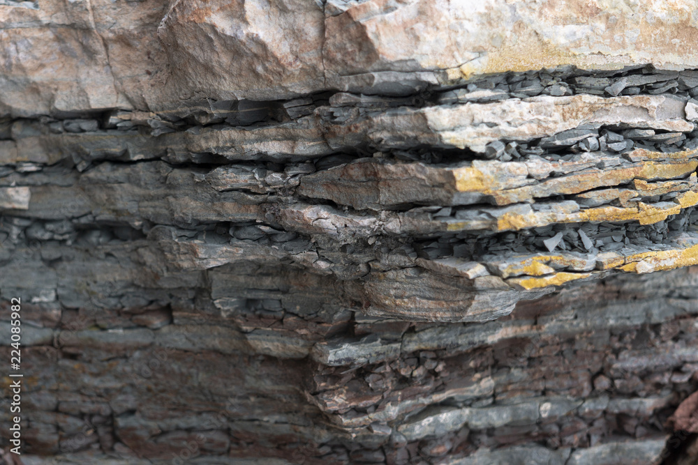 Soil cut-sandstone, stones, clay, sand structure and layers. slice of ...