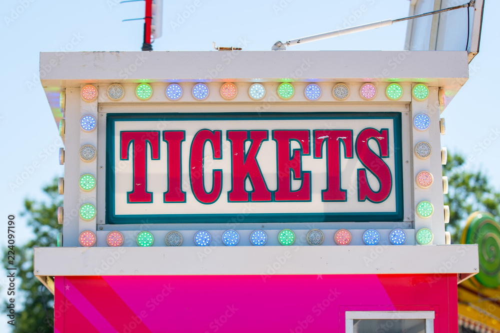 Colorful banner with word Tickets on it on top of the booth. Stock ...