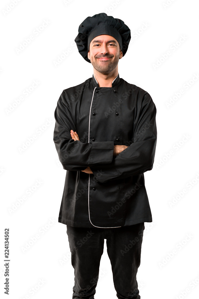 Chef man In black uniform keeping the arms crossed in frontal position ...