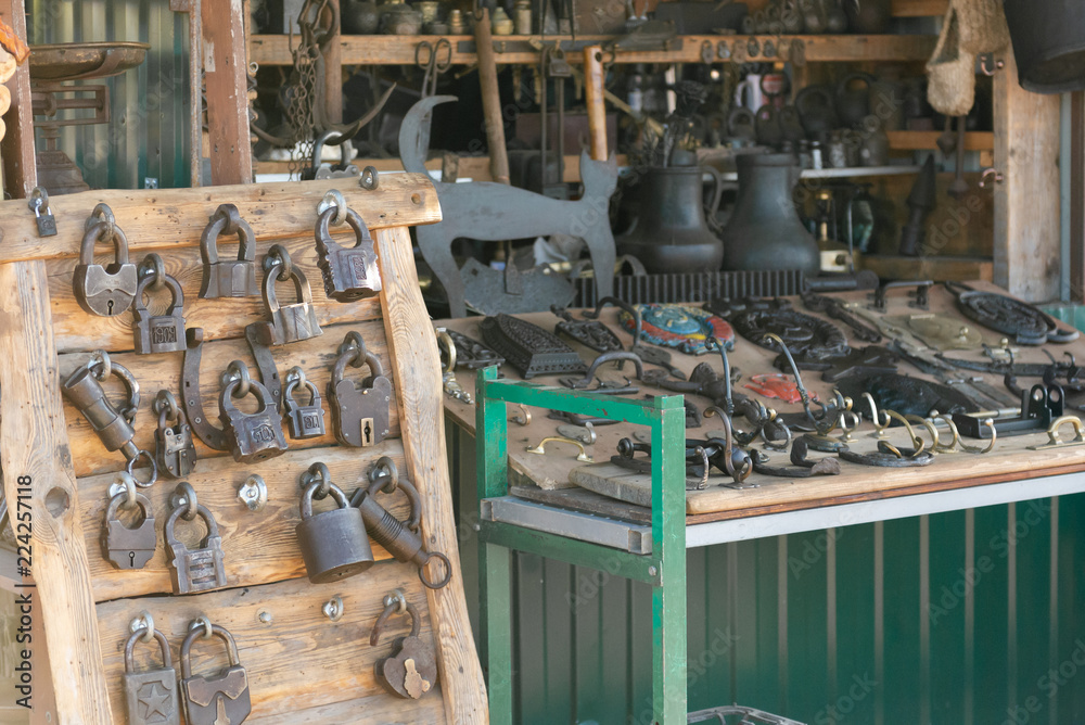 Flea market. Sale of old things. Hardware store. Goods from smithery ...