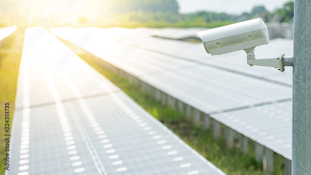 CCTV camera monitoring solar panels or polycrystalline silicon solar ...