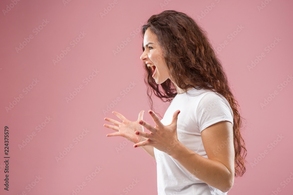 Screaming, hate, rage. Crying emotional angry woman screaming on pink ...