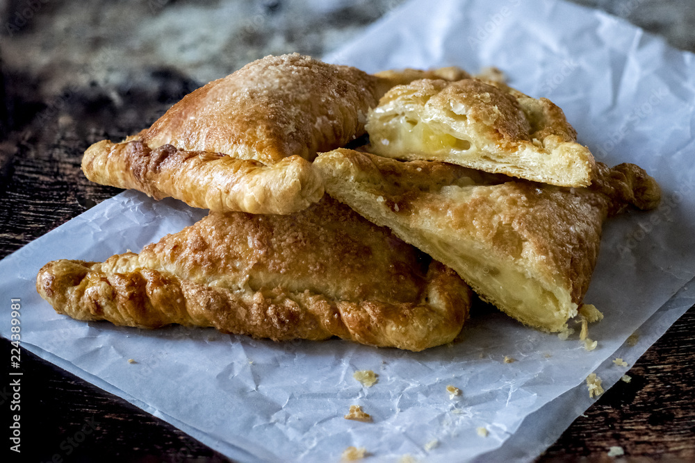 Flaky pastry laid on paper napkin Stock Photo | Adobe Stock