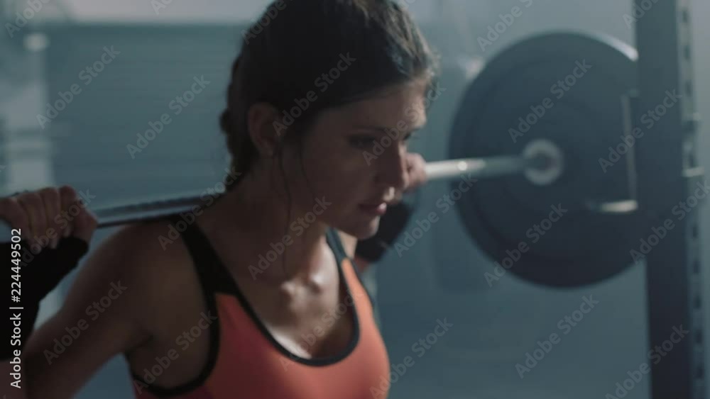 fitness woman bodybuilder using barbell weightlifting exercise strong ...