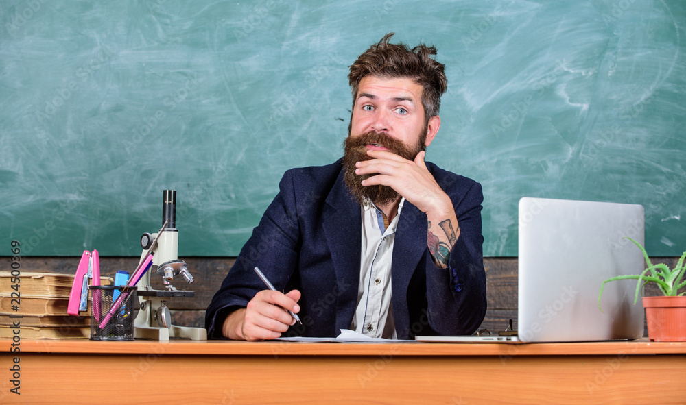 Teacher bearded man writing with pen busy with paperwork. Teachers ...
