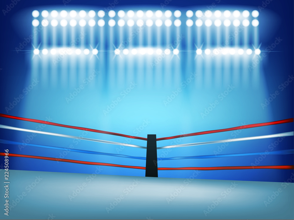 Boxing ring surrounded by ropes spotlit on and white smoke with blue ...