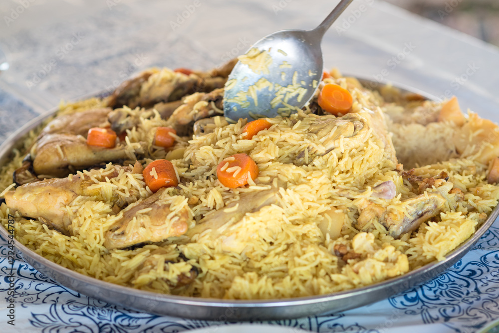 Maqluba traditional Arab food.The dish includes meat, rice, and Stock ...