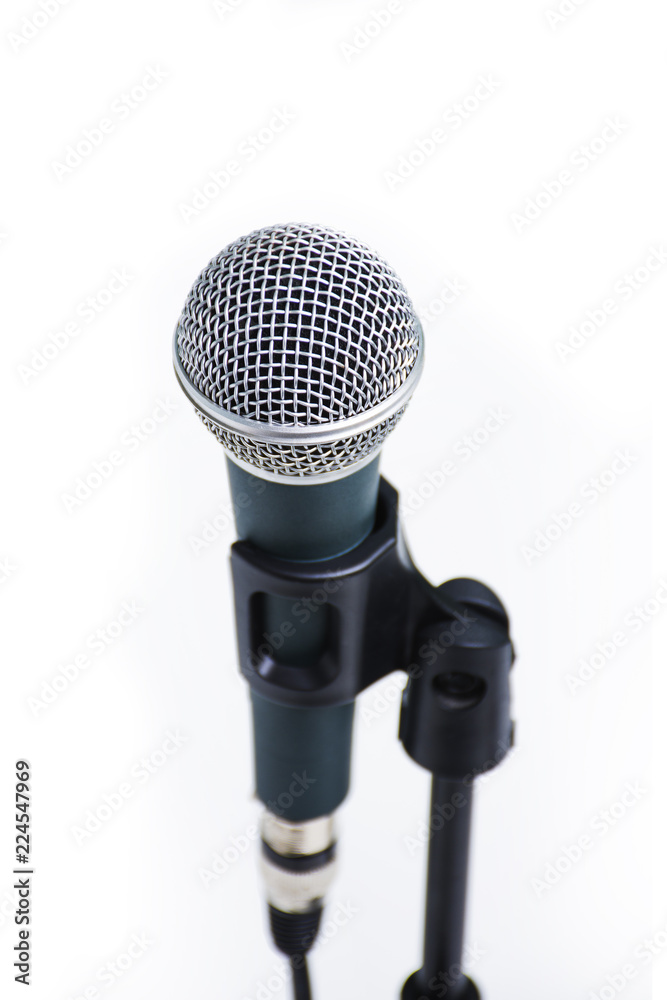 Professional vocal microphone on stand isolated on white background ...