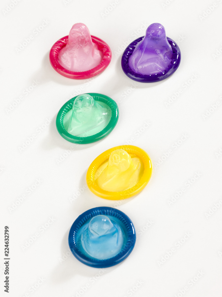 condones de colores Stock Photo | Adobe Stock