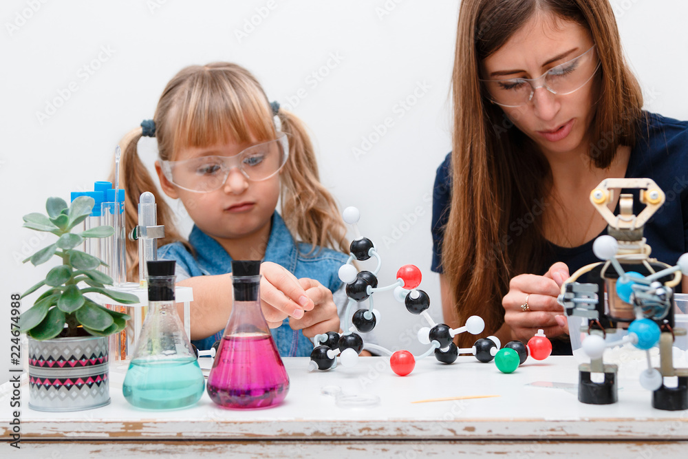 Science school, Museum of Science. A woman teacher and girl child ...