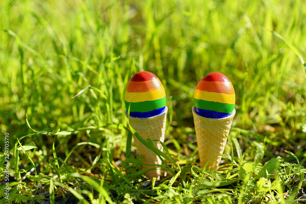 Lgbt couple family. Eggs with lgbt flag color in ice cream waffle cone ...