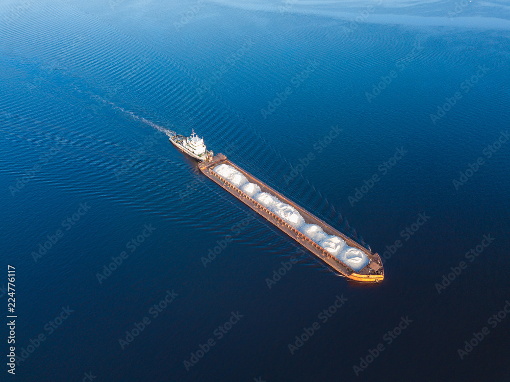 Aerial view carrier ship on river Volga. Cargo ship photo from drone ...