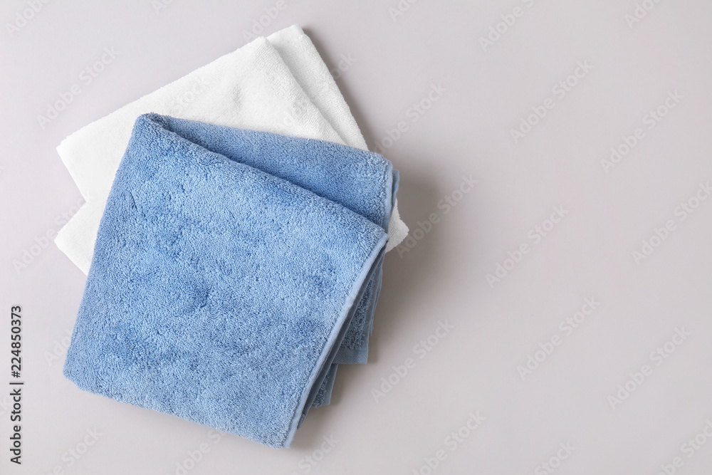 Clean soft towels on light background Stock Photo | Adobe Stock