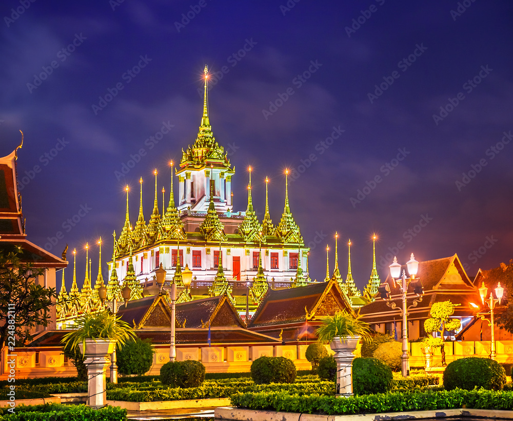 Metal Castle or Wat Ratchanadaram Worawiharn at night in Bangkok ...