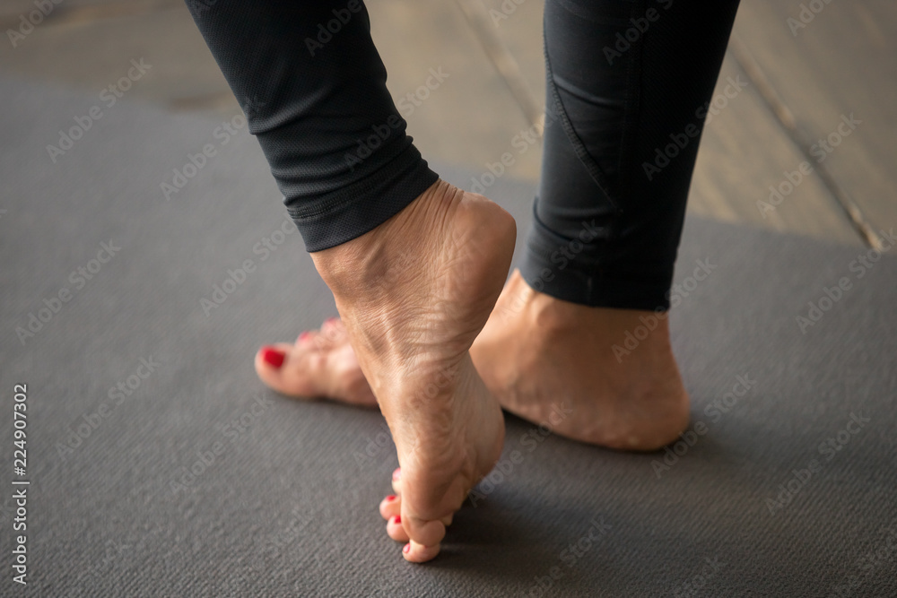 Sporty active woman practicing yoga, doing exercises to strengthen ...