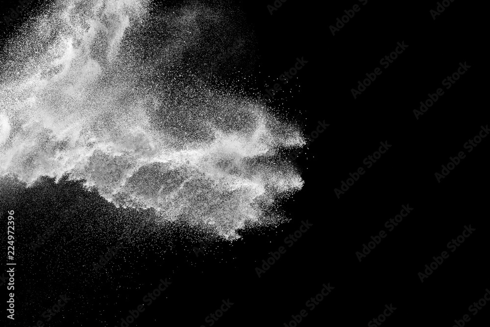 Bizarre forms of white powder explosion cloud against black background ...