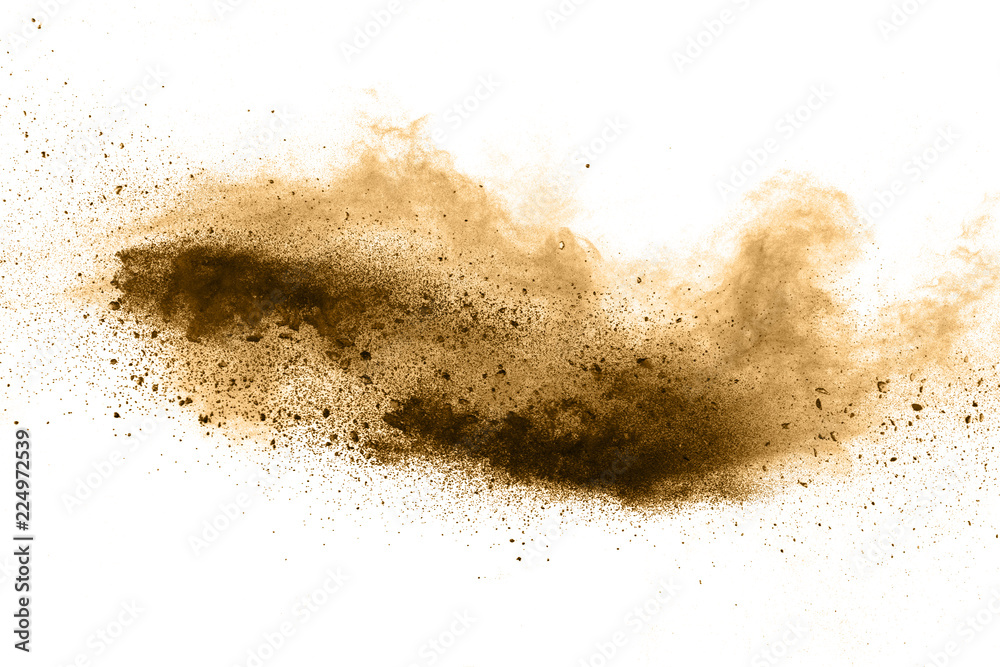 Stopping the movement of brown powder. Explosive brown powder on white ...