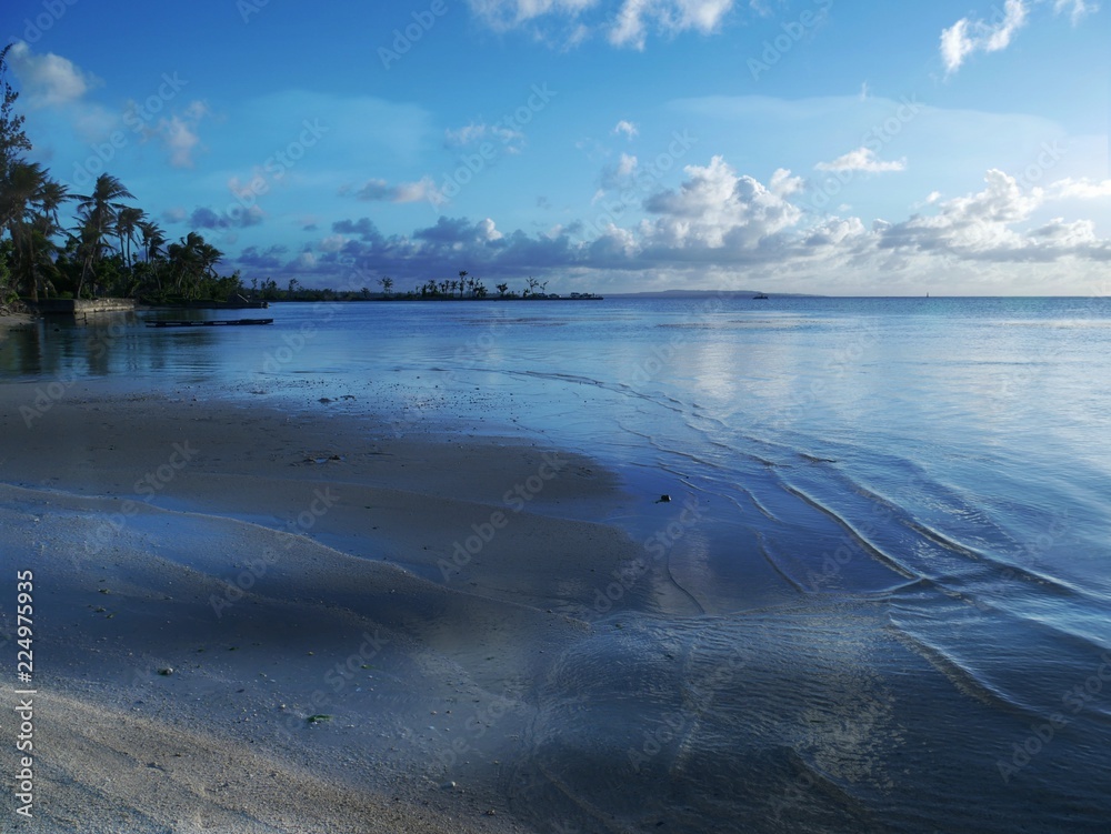 Beautiful peaceful beach looking toward the Fishing Base in Garapan ...