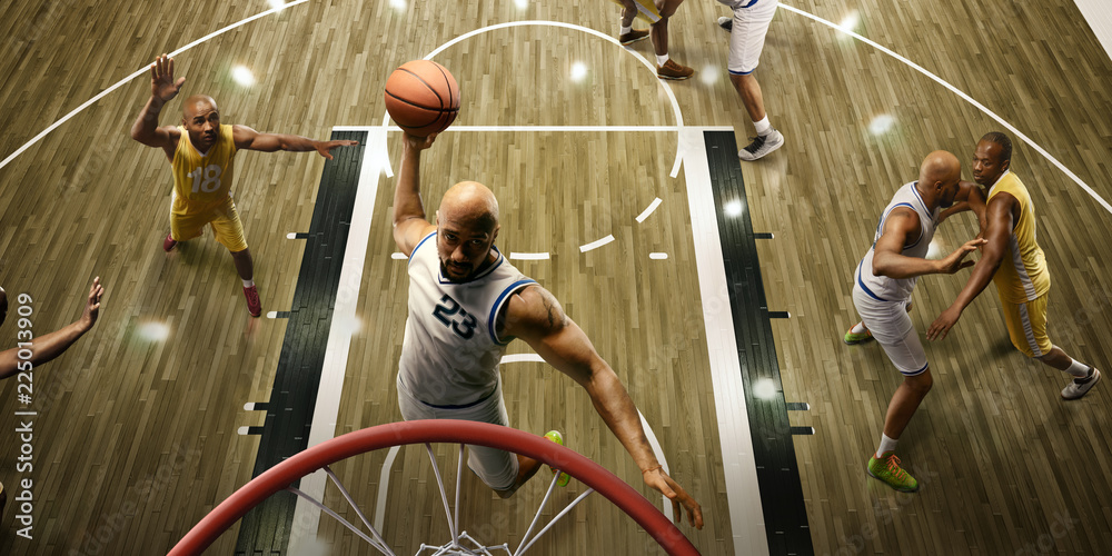 Basketball players on big professional arena during the game ...