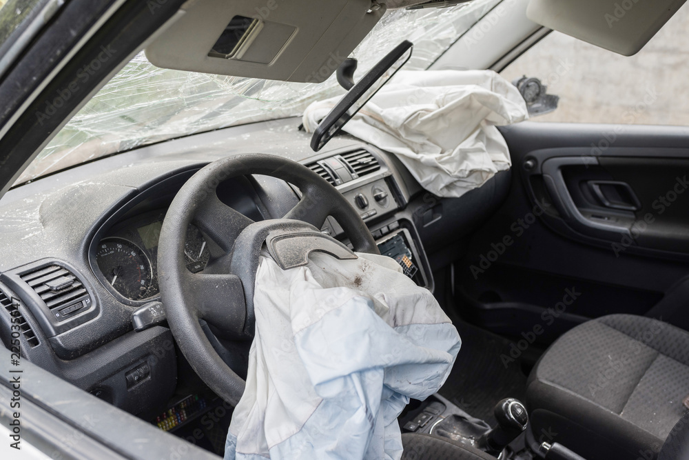 Airbag exploded at a car accident. Car after an accident. Stock Photo ...