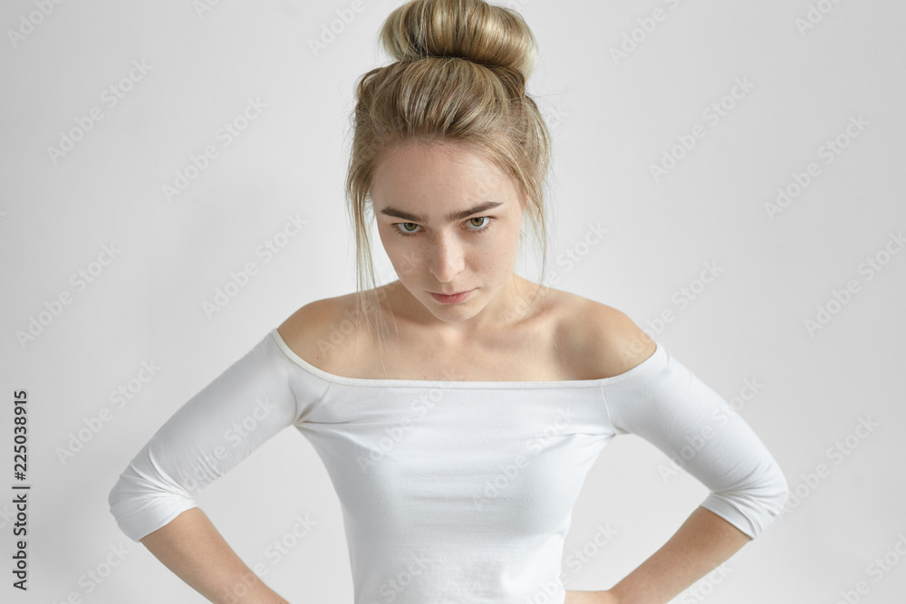 Negative human facial expression and reaction. Isolated shot of angry ...