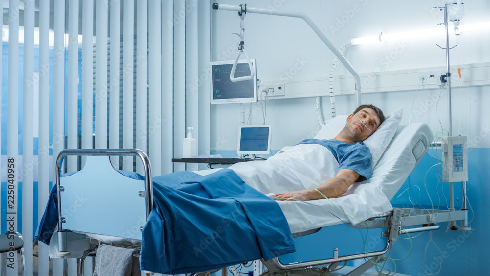 Sick Male Patient Lying on a Bed in the Private Ward in Hospital. White ...