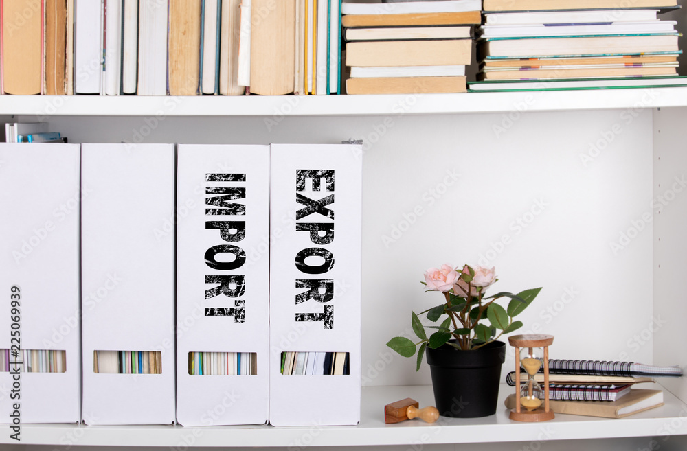 Import and Export concept. document folders and organizers, white book ...