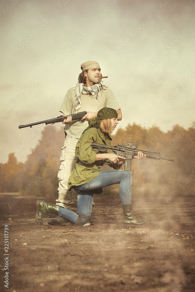 Guerilla, partisan or territory army couple watching around armed with ...